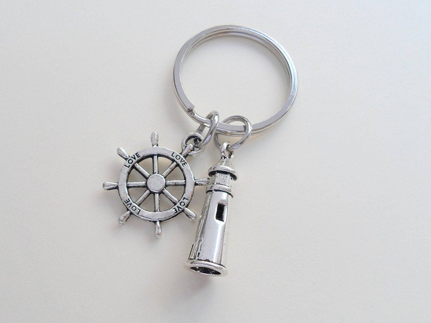 Lighthouse Keychain With Ships Helm - "Your Light Helps Guide Me Home ...